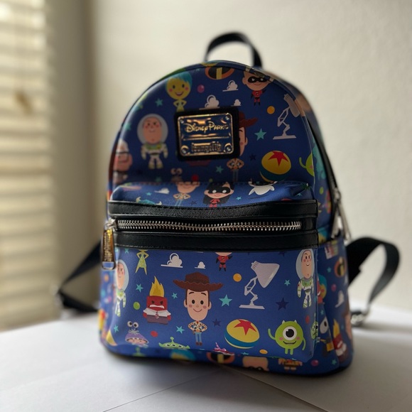 Loungefly | Bags | Rare Loungefly Disney World Of Pixar Woody Buzz ...